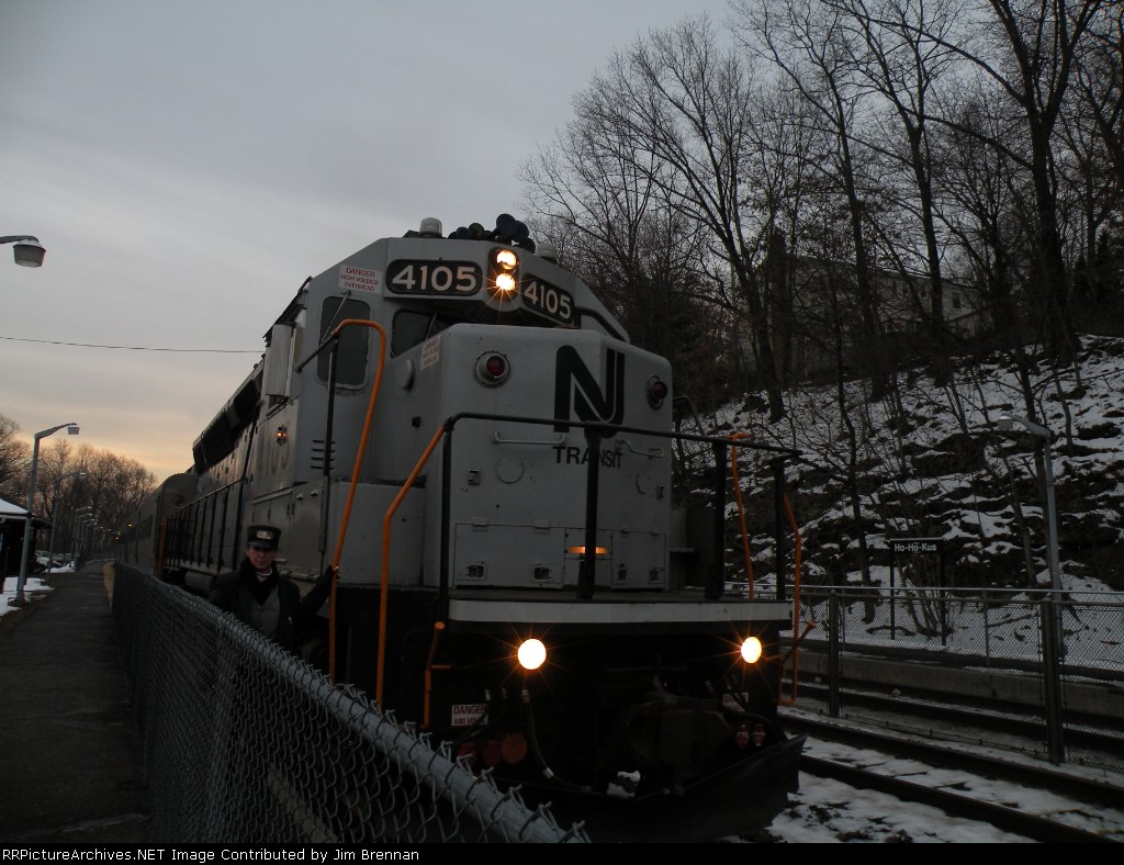 NJT GP40PH-2 #4105 and The conductor gets ready to flag.